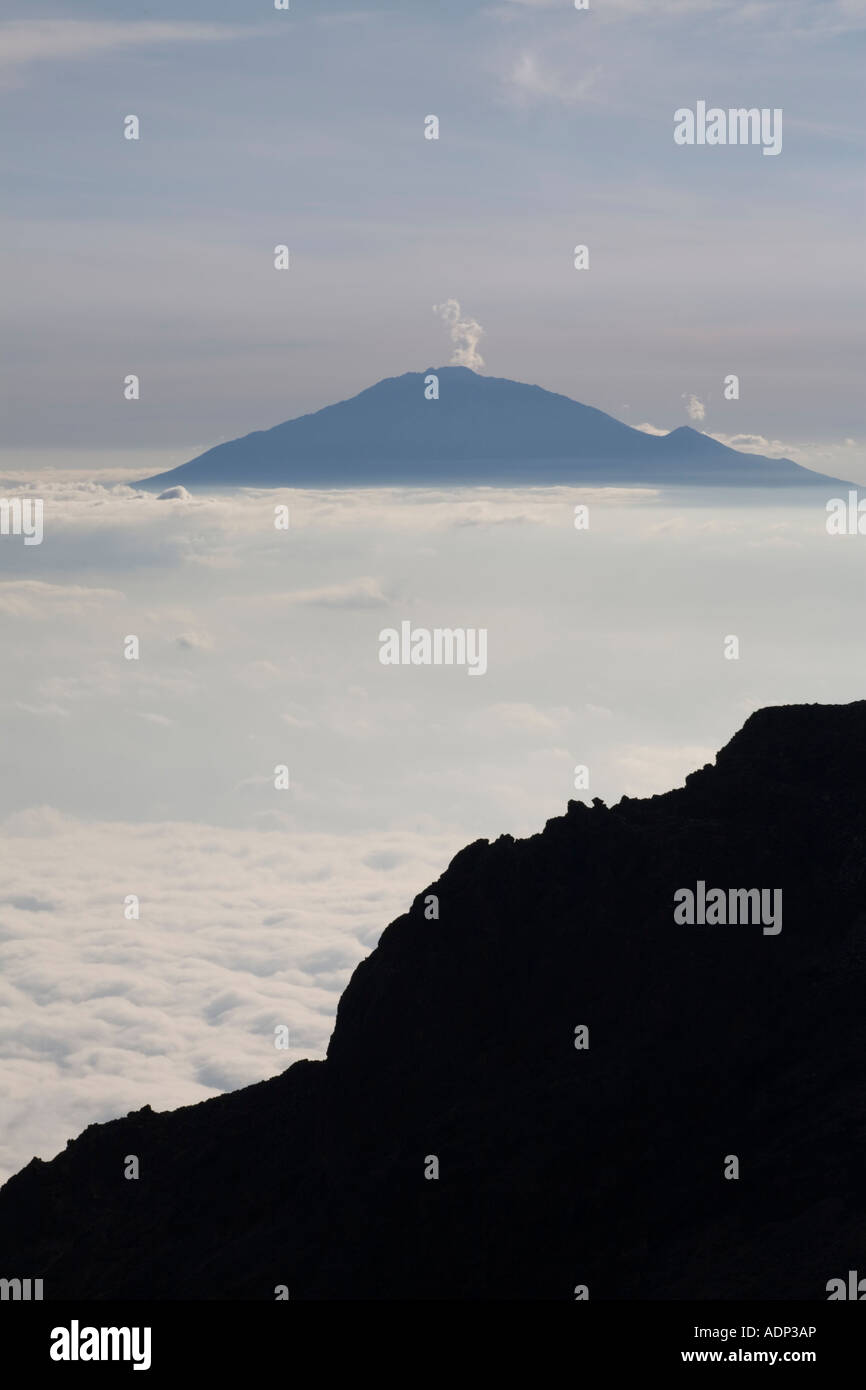 Africa Tanzania Kilimanjaro National Park Mount Meru at dusk view from ...