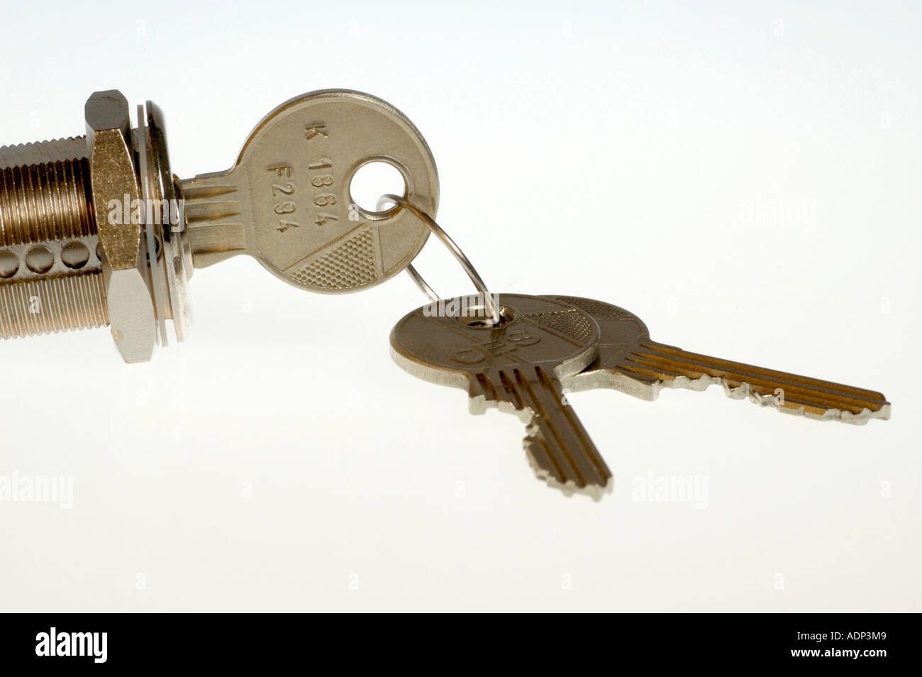 Lock with three keys Stock Photo - Alamy