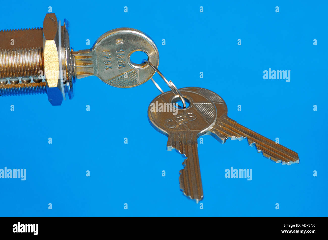 Lock with three keys Stock Photo - Alamy
