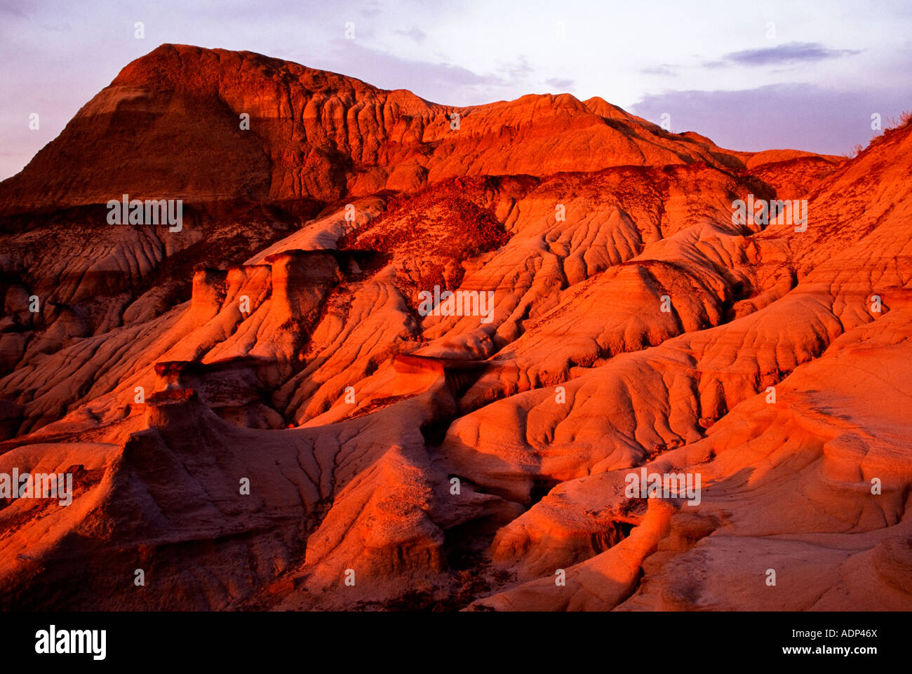 Sand stone hill in sunset Stock Photo - Alamy