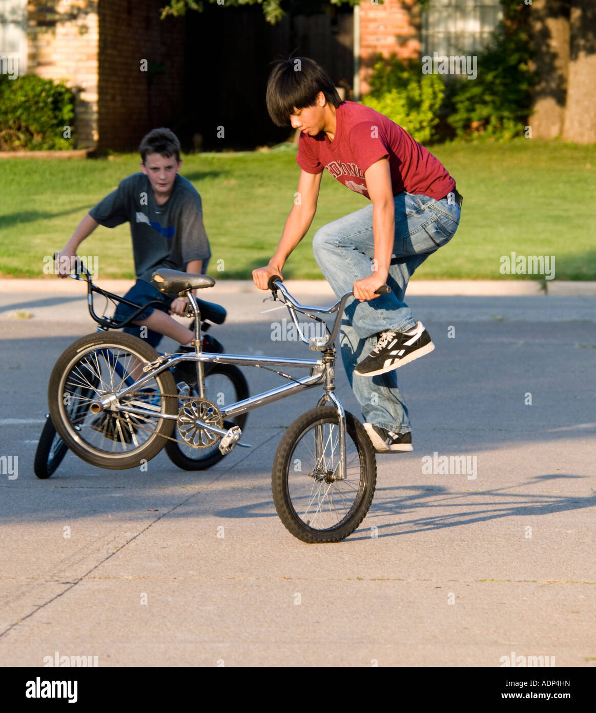 Caucasian boys riding bicycles hi-res stock photography and images - Alamy