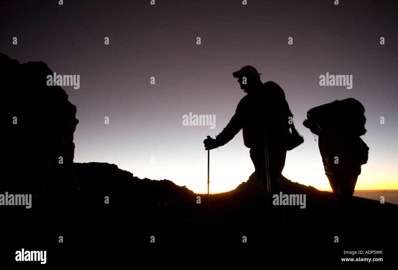 Africa Tanzania Kilimanjaro National Park MR Silhouette of climber ...