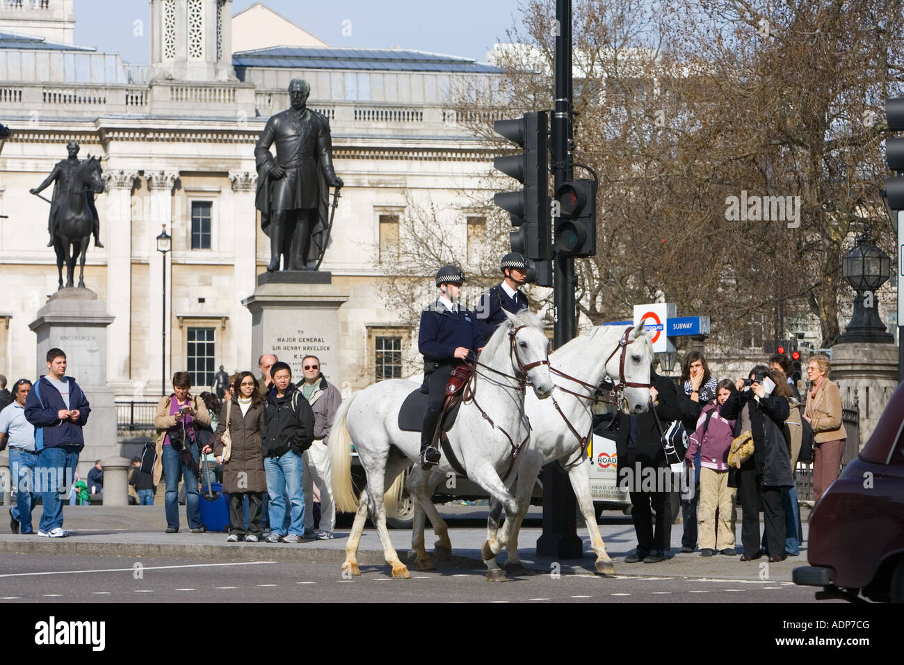 Community police officers on horseback in Trafalgar Square London ...