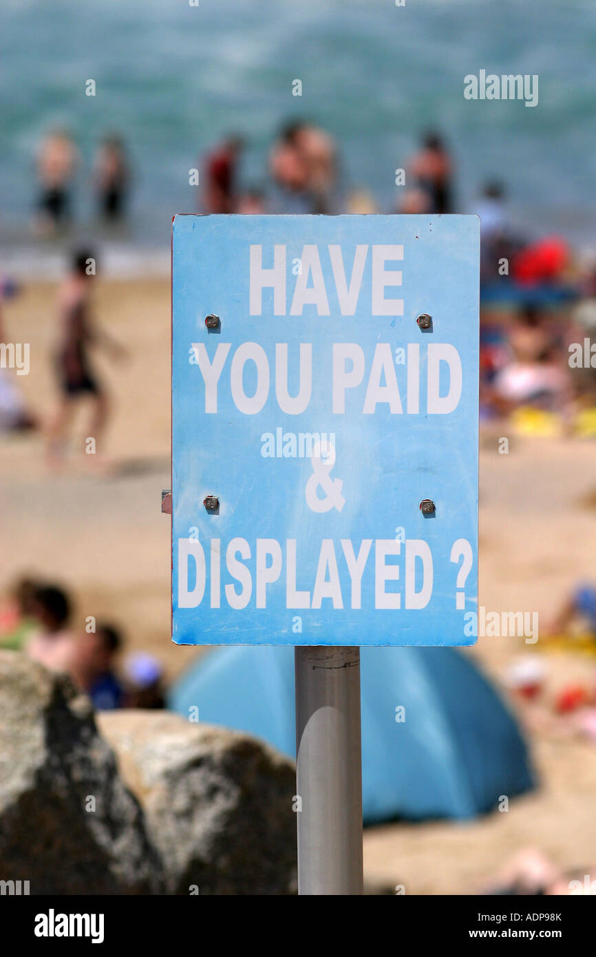 Faded paid and display seaside car park sign Newquay Cornwall Stock ...