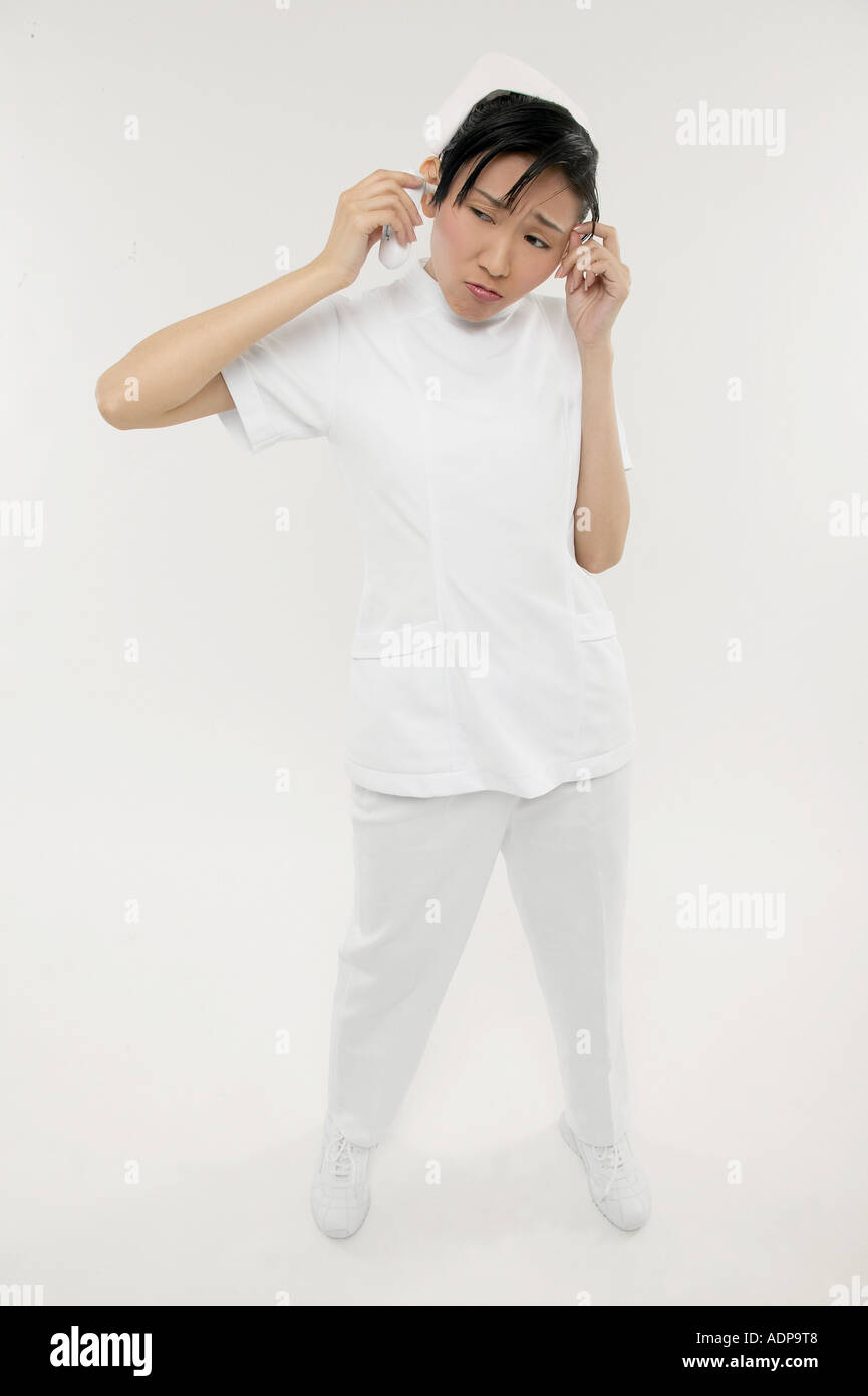 Looking away holding standing measuring instrument of measurement hi ...
