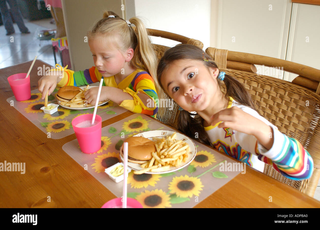 Two Girls Eating Chips High Resolution Stock Photography and Images - Alamy