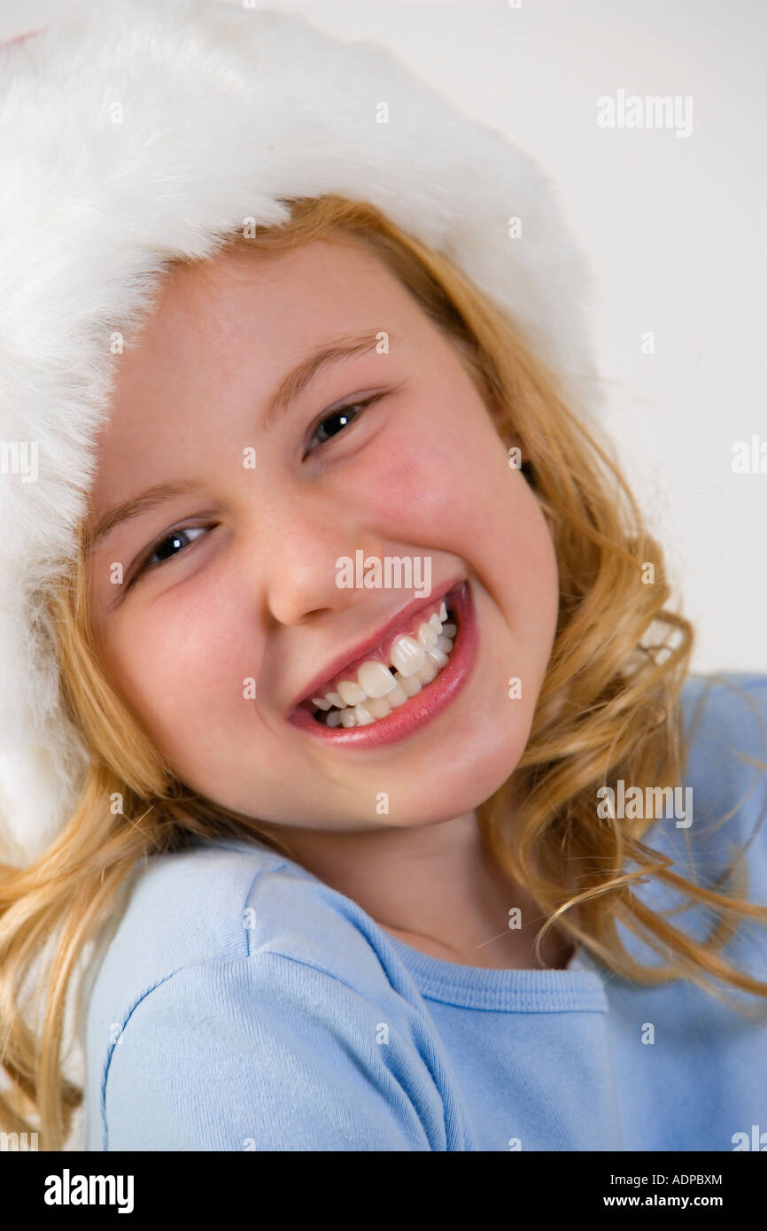 Young girl wearing a fuzzy hat Stock Photo - Alamy