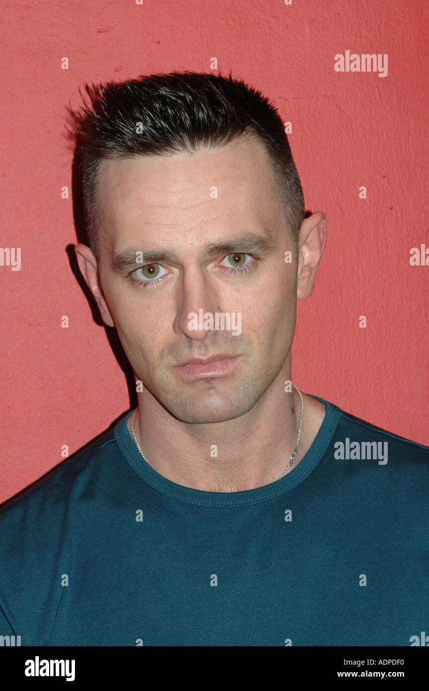 Hot man wearing red shirt hi-res stock photography and images - Alamy
