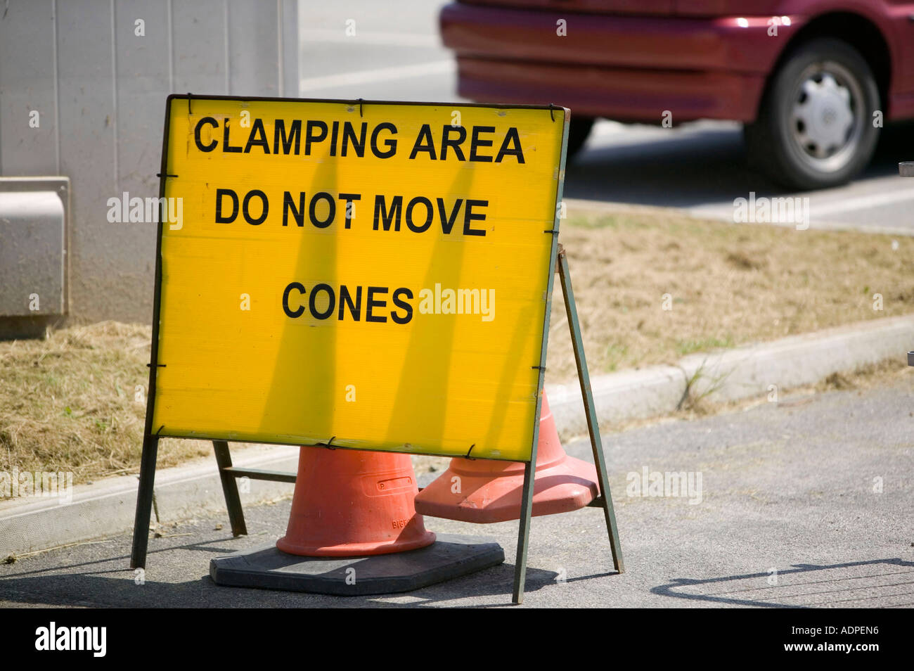 sign warning of clamping at Newquay airport, Cornwall, UK Stock Photo ...
