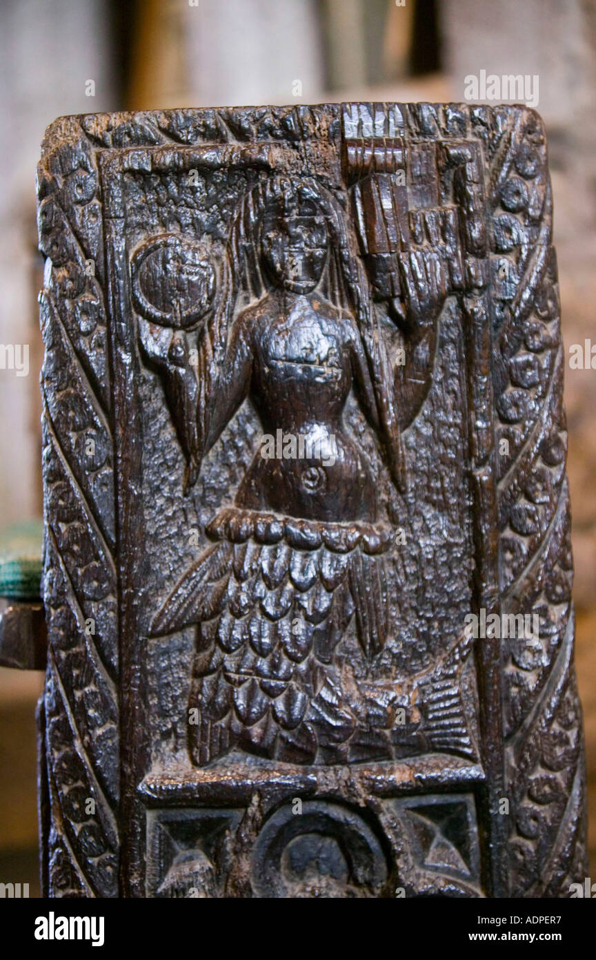 a mermaid carved into an ancient church bench in Zennor church ...