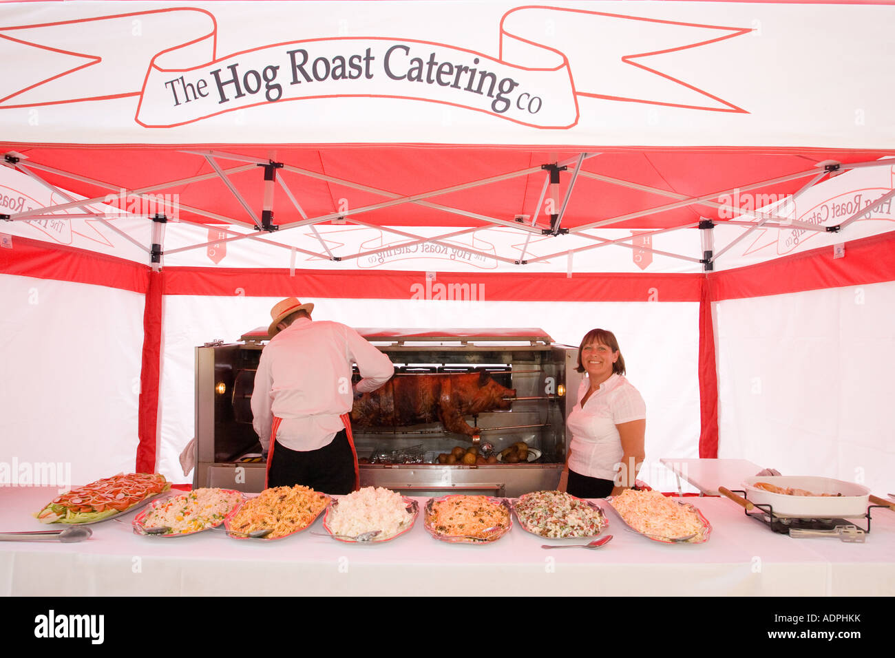 spit roasting a hog Stock Photo - Alamy