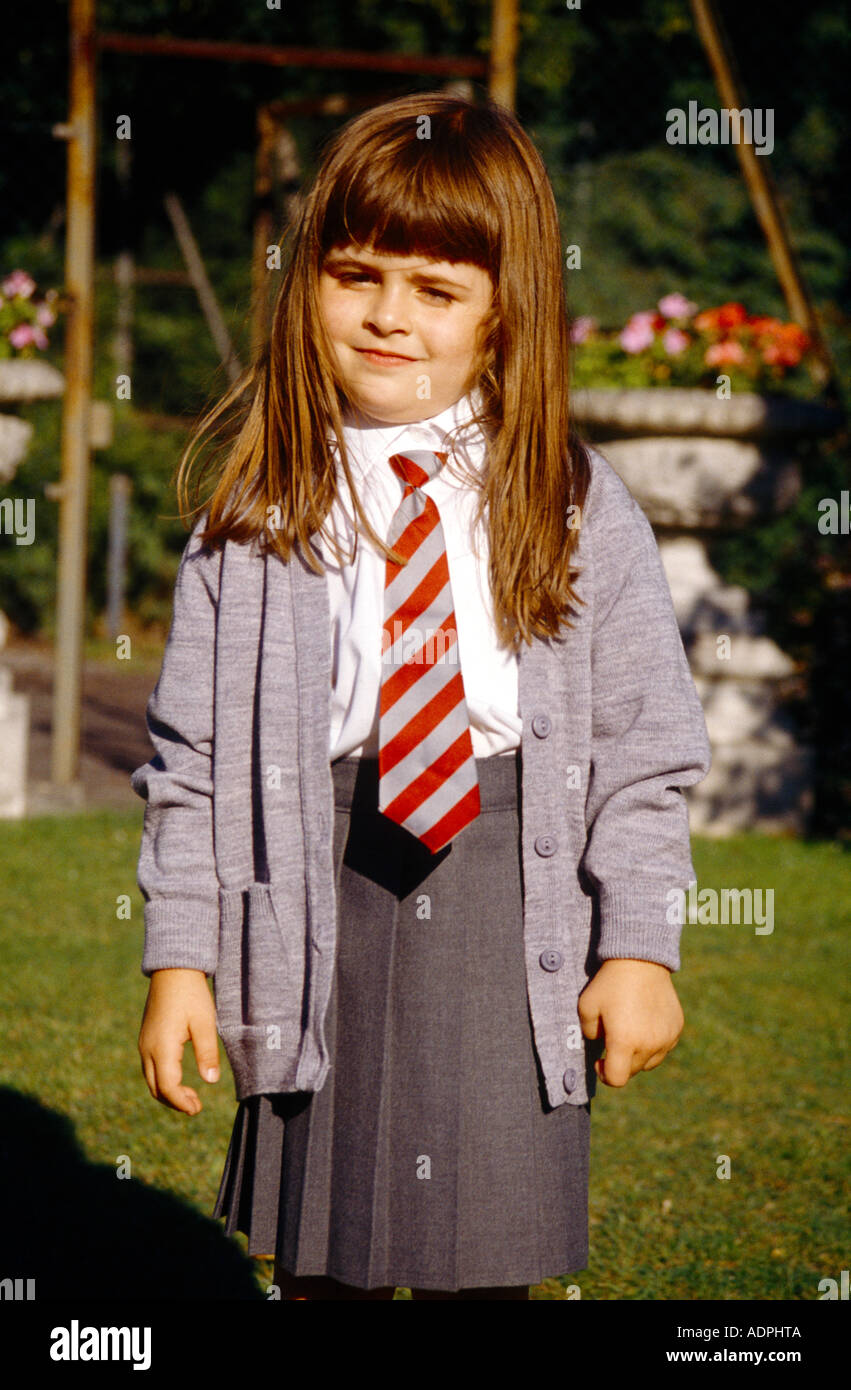 Girl In School Uniform First Day At Primary School Stock Photo - Alamy