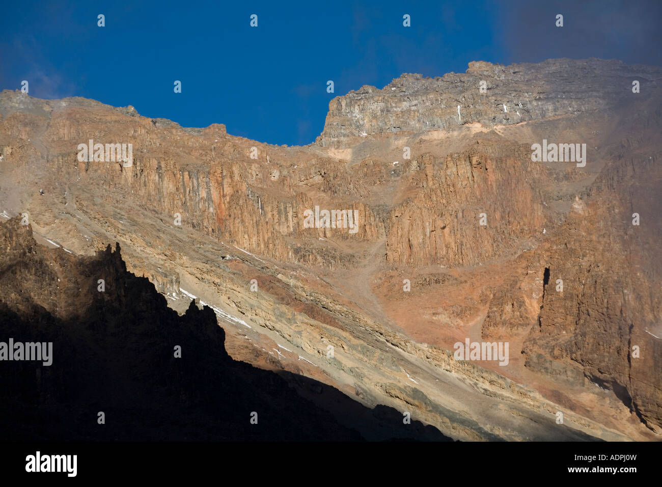 Africa Tanzania Kilimanjaro National Park Setting sun lights clouds ...