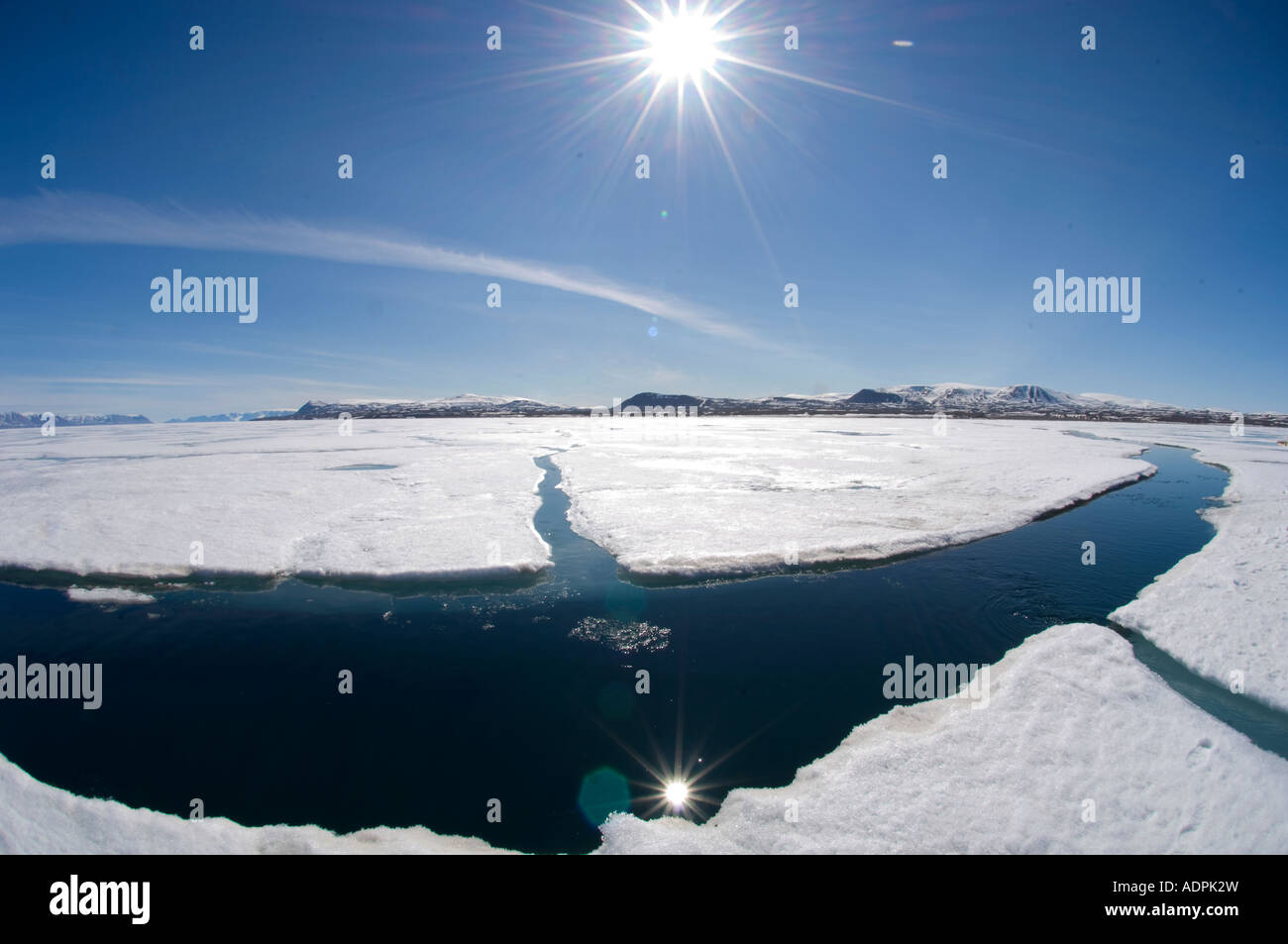 Cracks and leads form in the sea ice as the spring melt/breakup ...