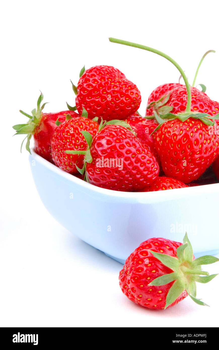 A Bowl Of Fresh Red Strawberries Cut Out Isolated On A White Background ...