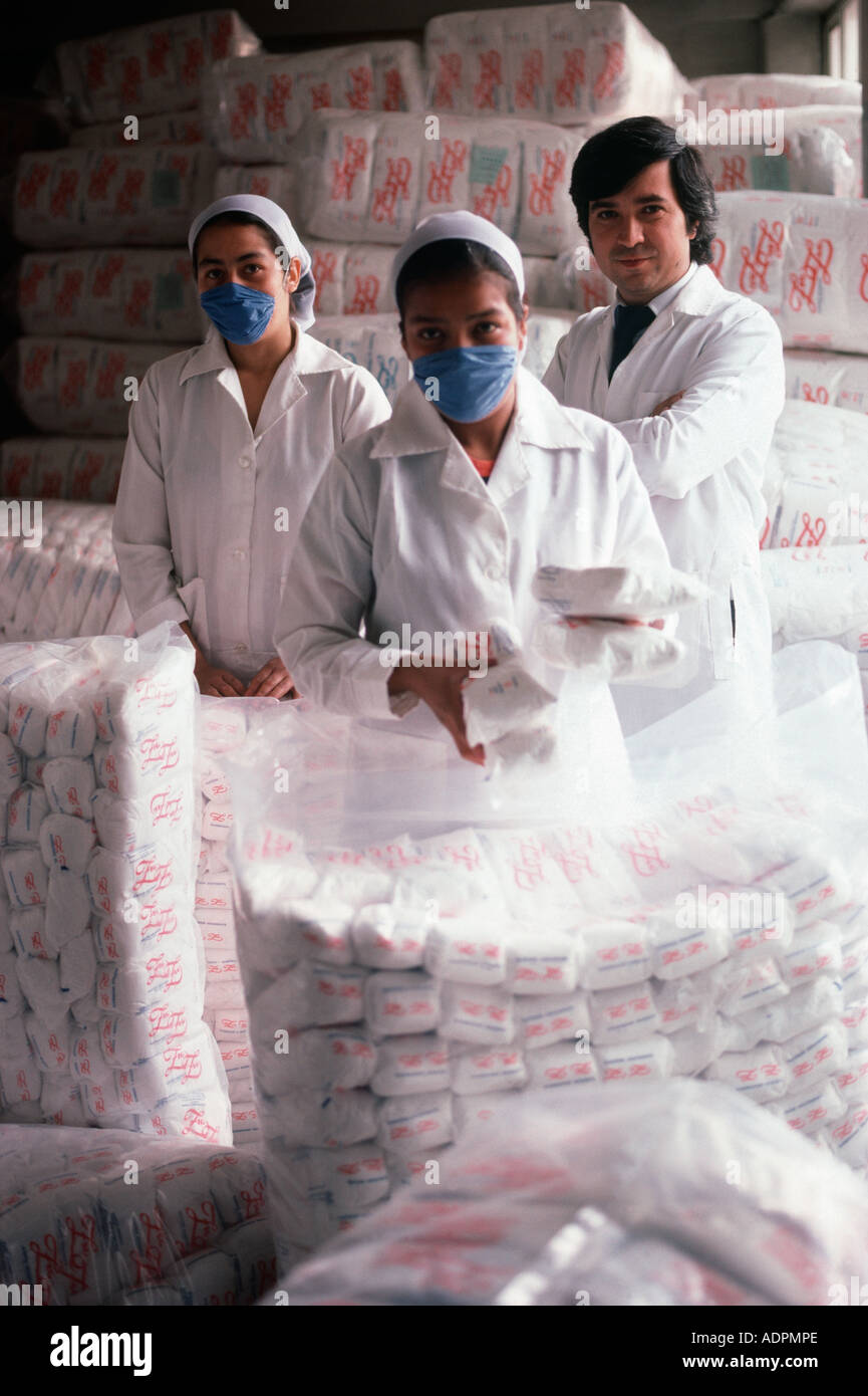 Mexican warehouse workers pose with packaged sugar Stock Photo - Alamy