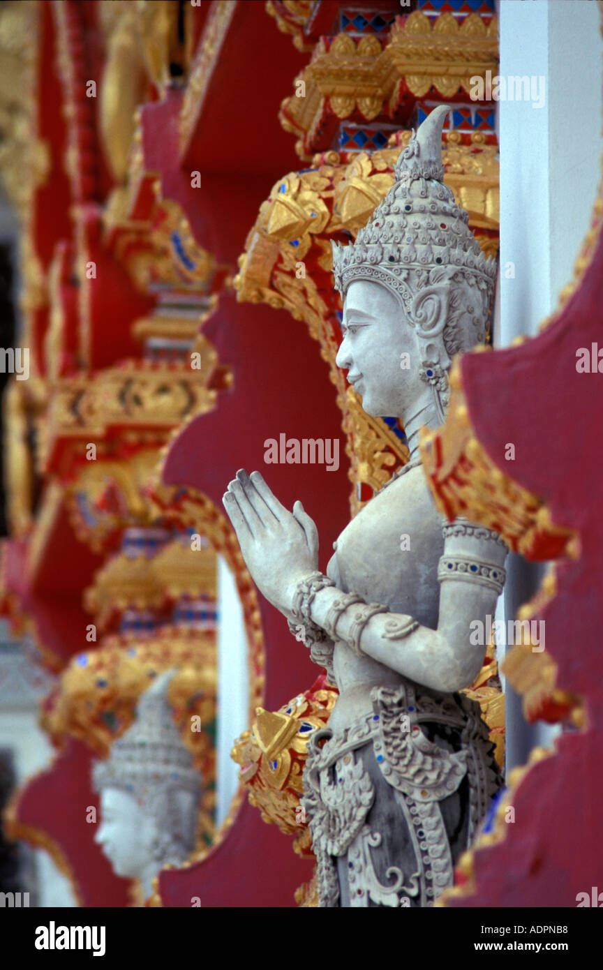 stone praying figure Wat Phra That Suthon Mongkhon Khiri In Stock Photo ...