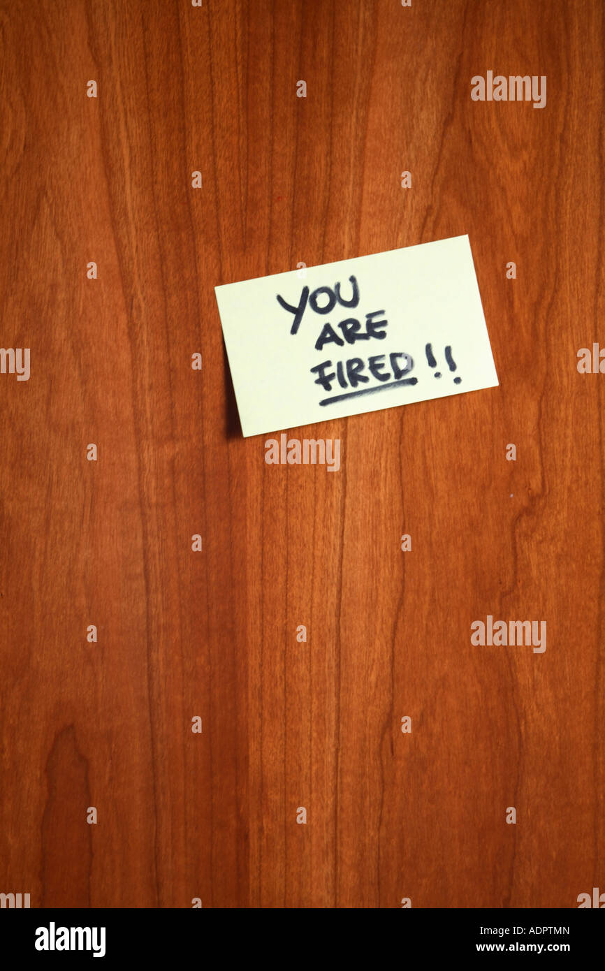 you are fired ! written on a post it note Stock Photo - Alamy