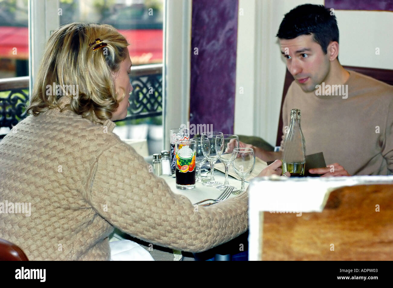 PARIS France, Young Adult Couple Sharing Meals inside at Table in ...