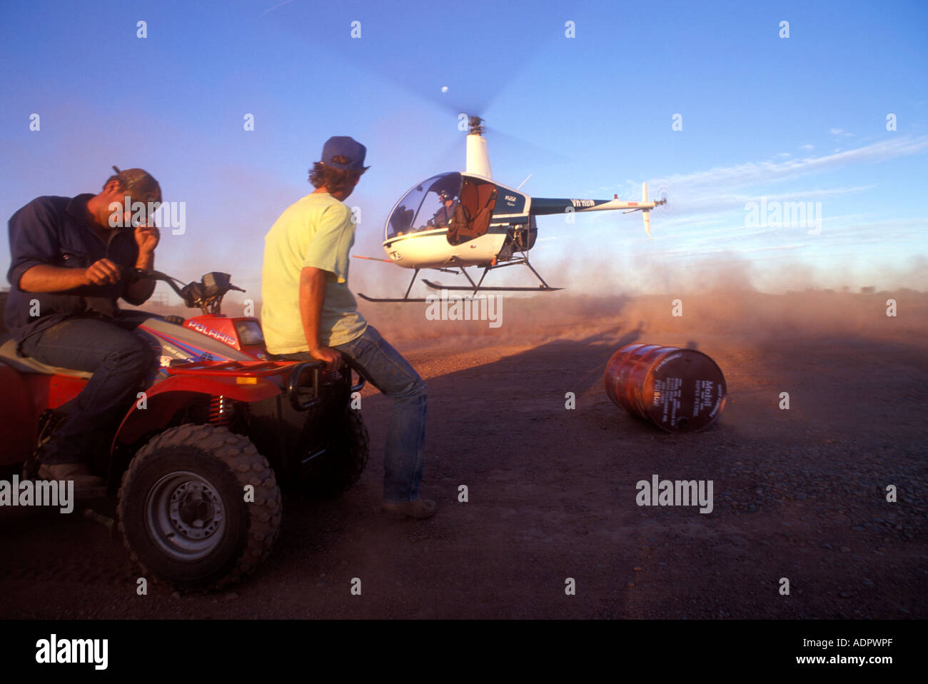 Australia Northern Territory MR Ranch hands take cover as helicopter ...