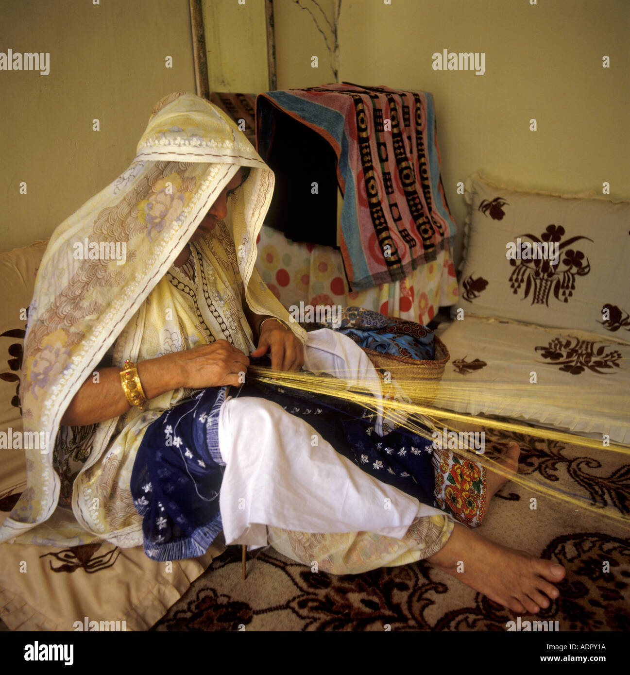 Gold headscarf hi-res stock photography and images - Alamy