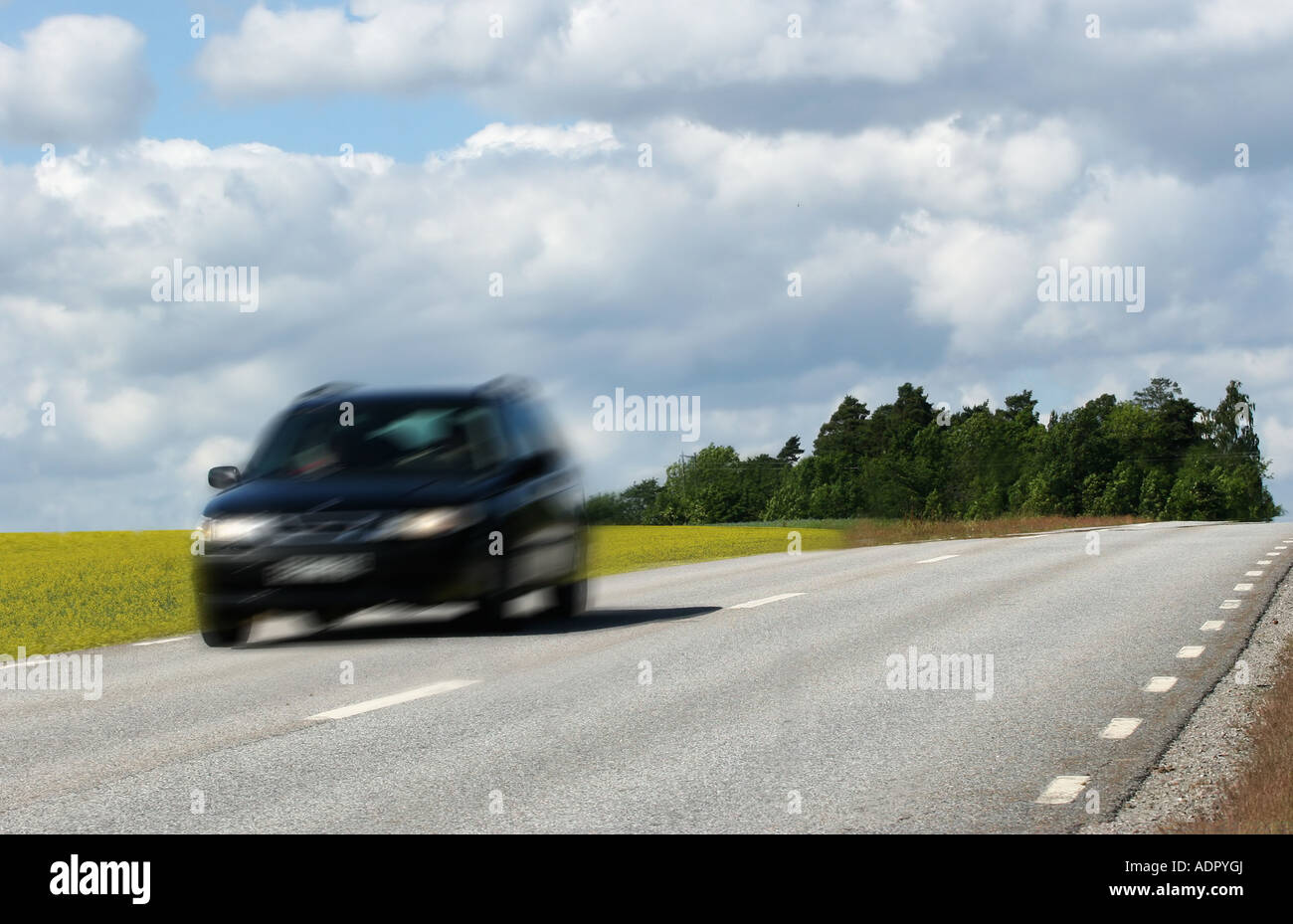 Car in motion Stock Photo - Alamy