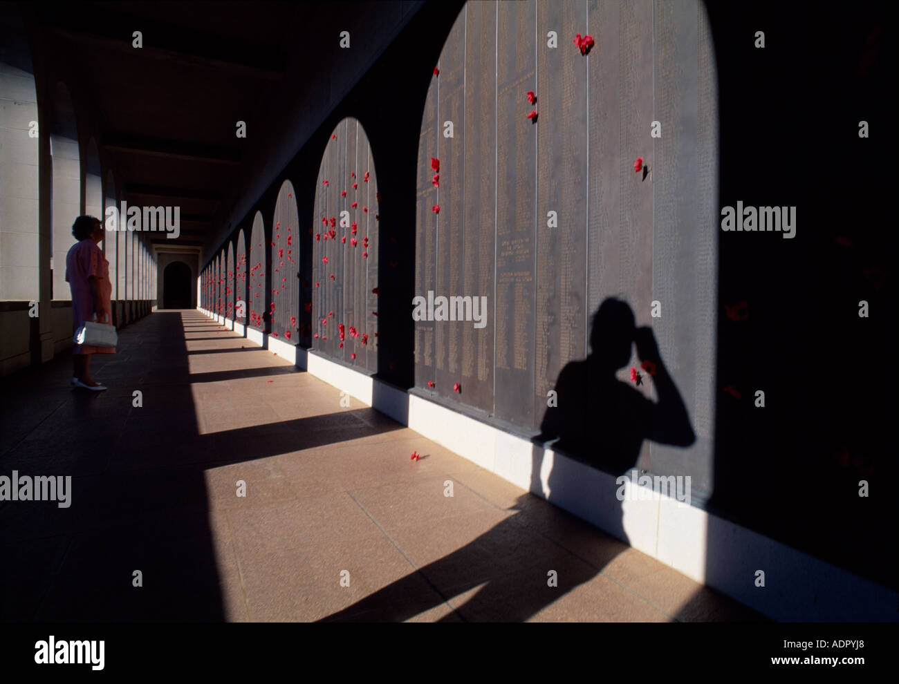 Australia Capital Territory Shadow on walls lined with names of war ...