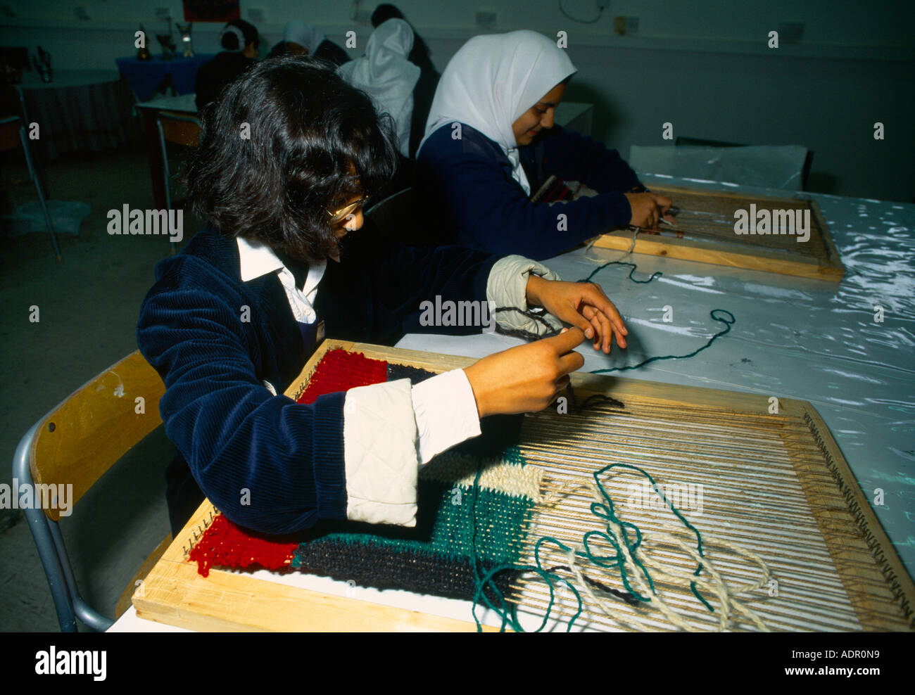 Kuwait Muslim Children Weaving at School Stock Photo - Alamy