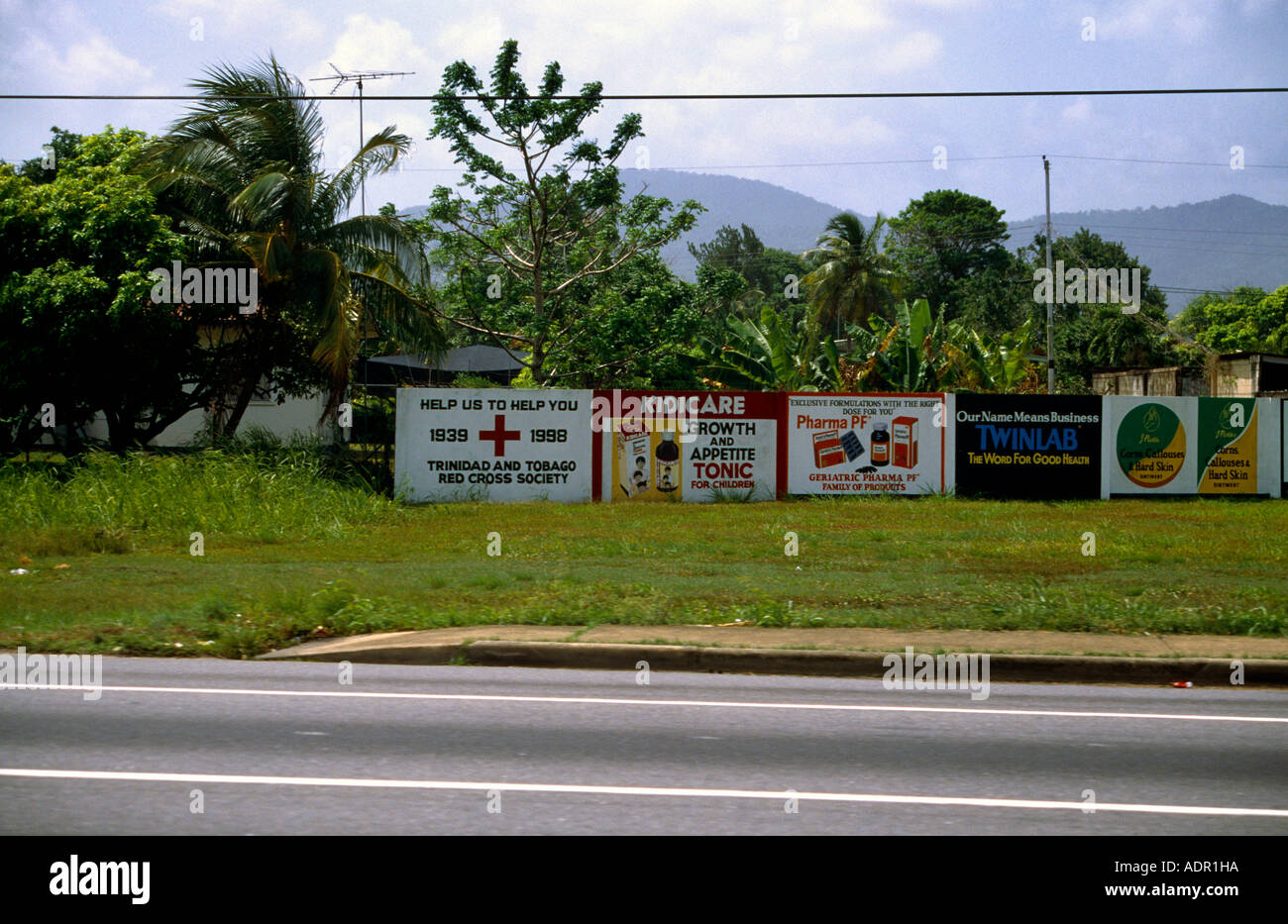 Port of Spain Trinidad Line of Advertising Signs at Roadside Stock ...