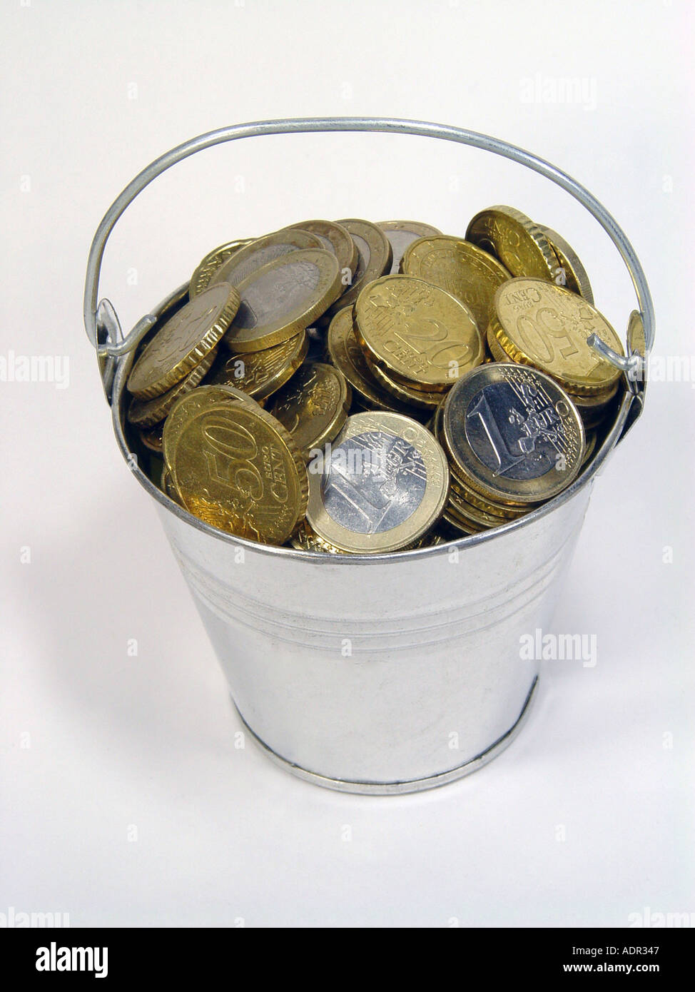 Bucket with euro coins as symbol for wealth money in large quantities ...