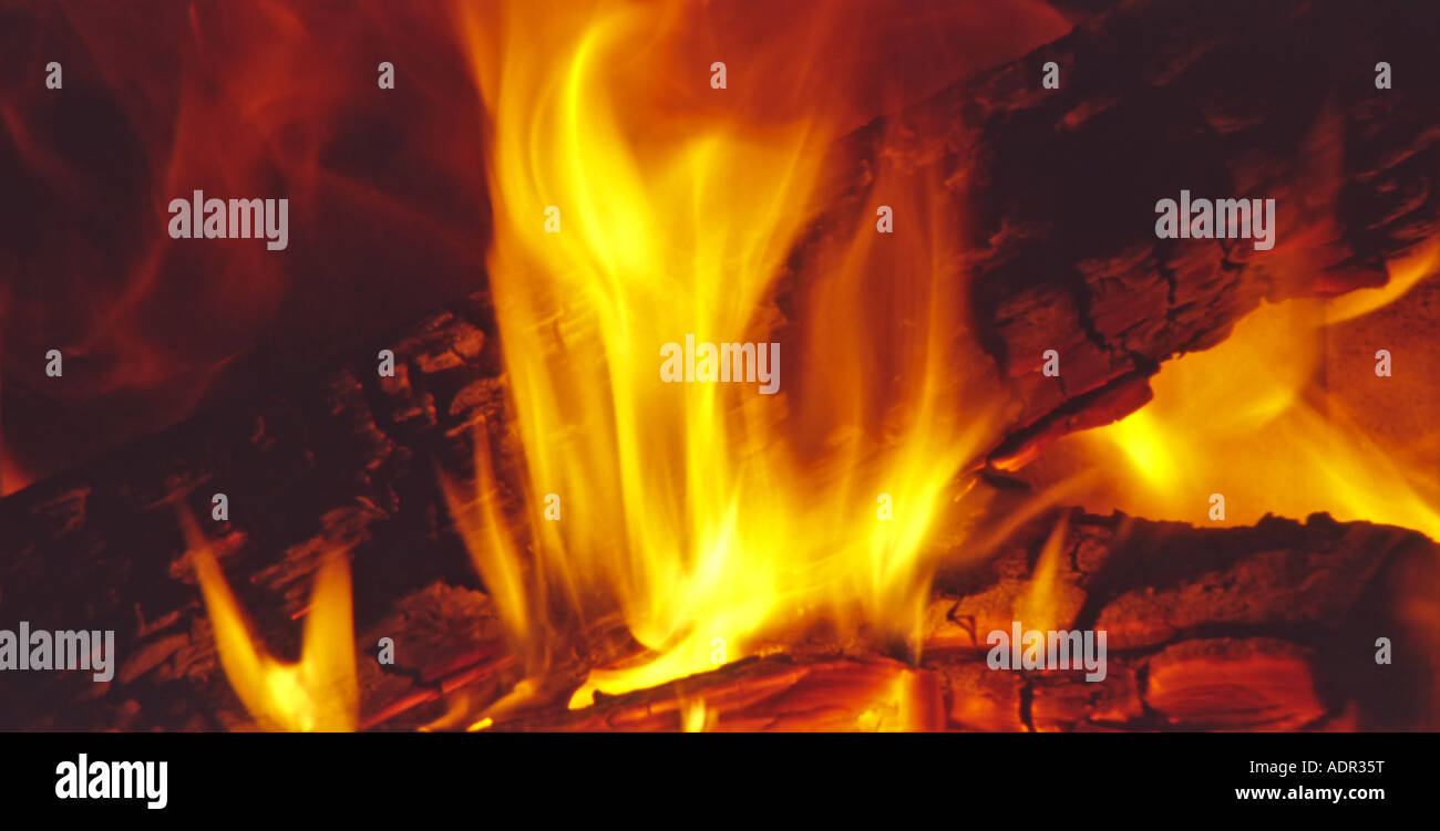 A close view of a hot and cozy fire inside a wood burning stove Stock ...