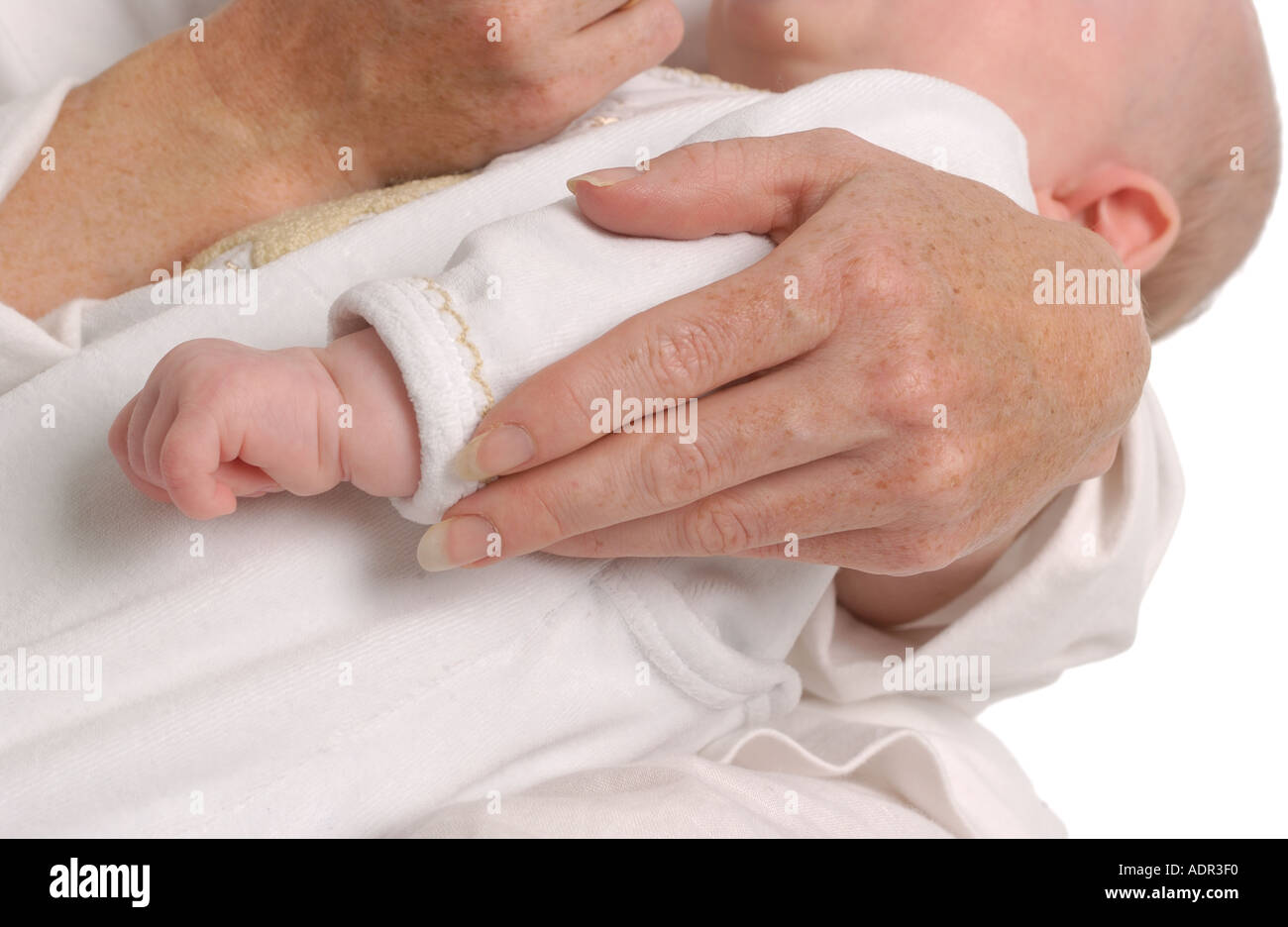 Motherhand holding a baby Stock Photo - Alamy