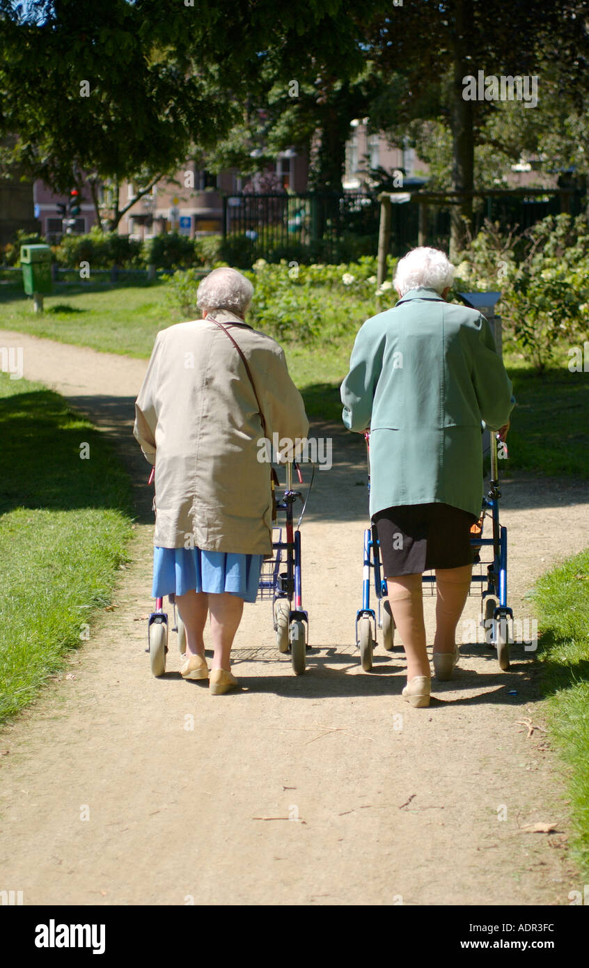Senior women walking with a rollator Stock Photo - Alamy