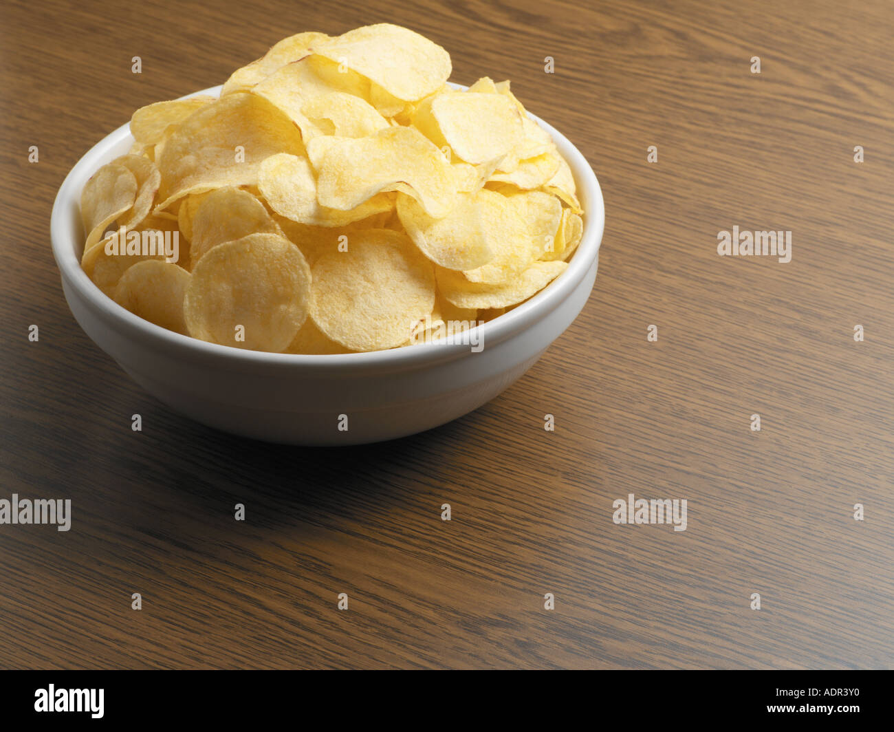 Bowl of crisps Stock Photo - Alamy