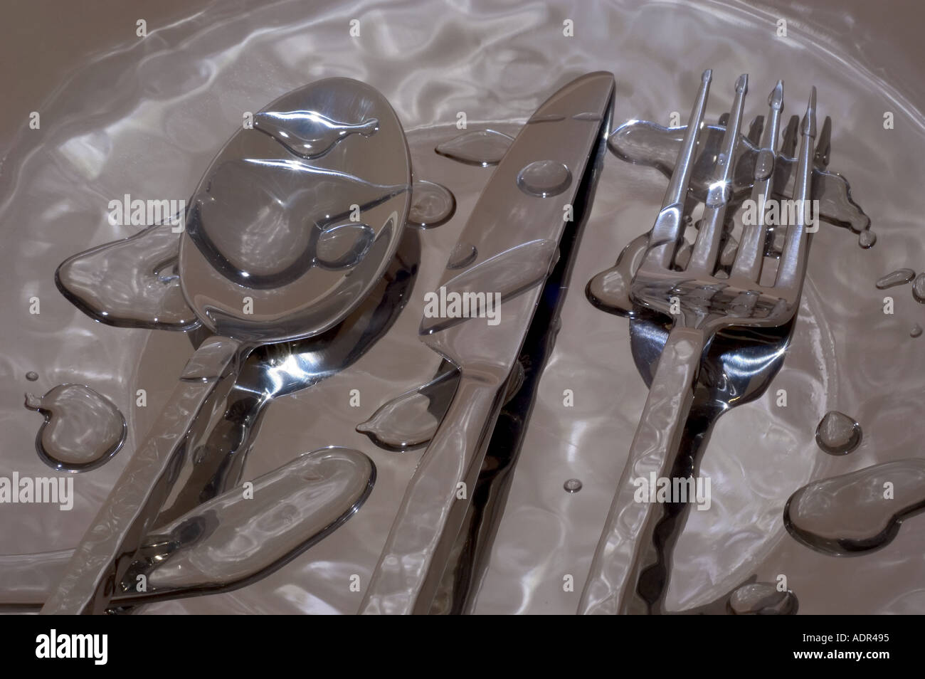 Washing silver ware hi-res stock photography and images - Alamy