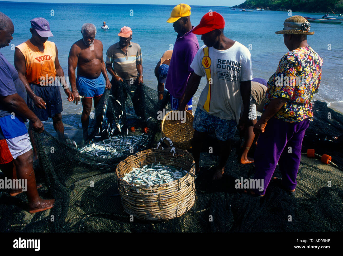Fishermen bringing in their nets hi-res stock photography and images ...