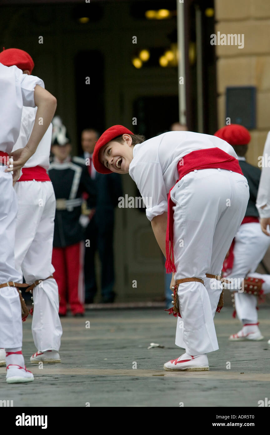 Young boy smiling during performance of traditional Basque folk dances ...