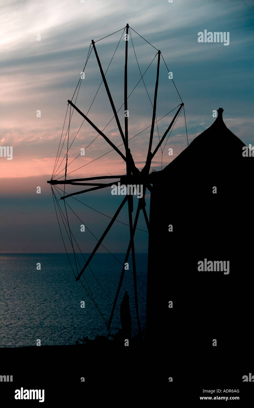 Windmill silhouette tower sunset glow dusk hi-res stock photography and ...