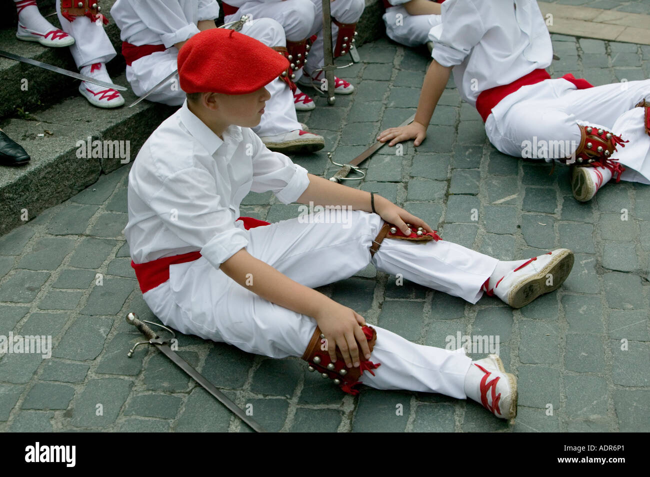 Young Basque boy rests after performing traditional folk dances Plaza ...