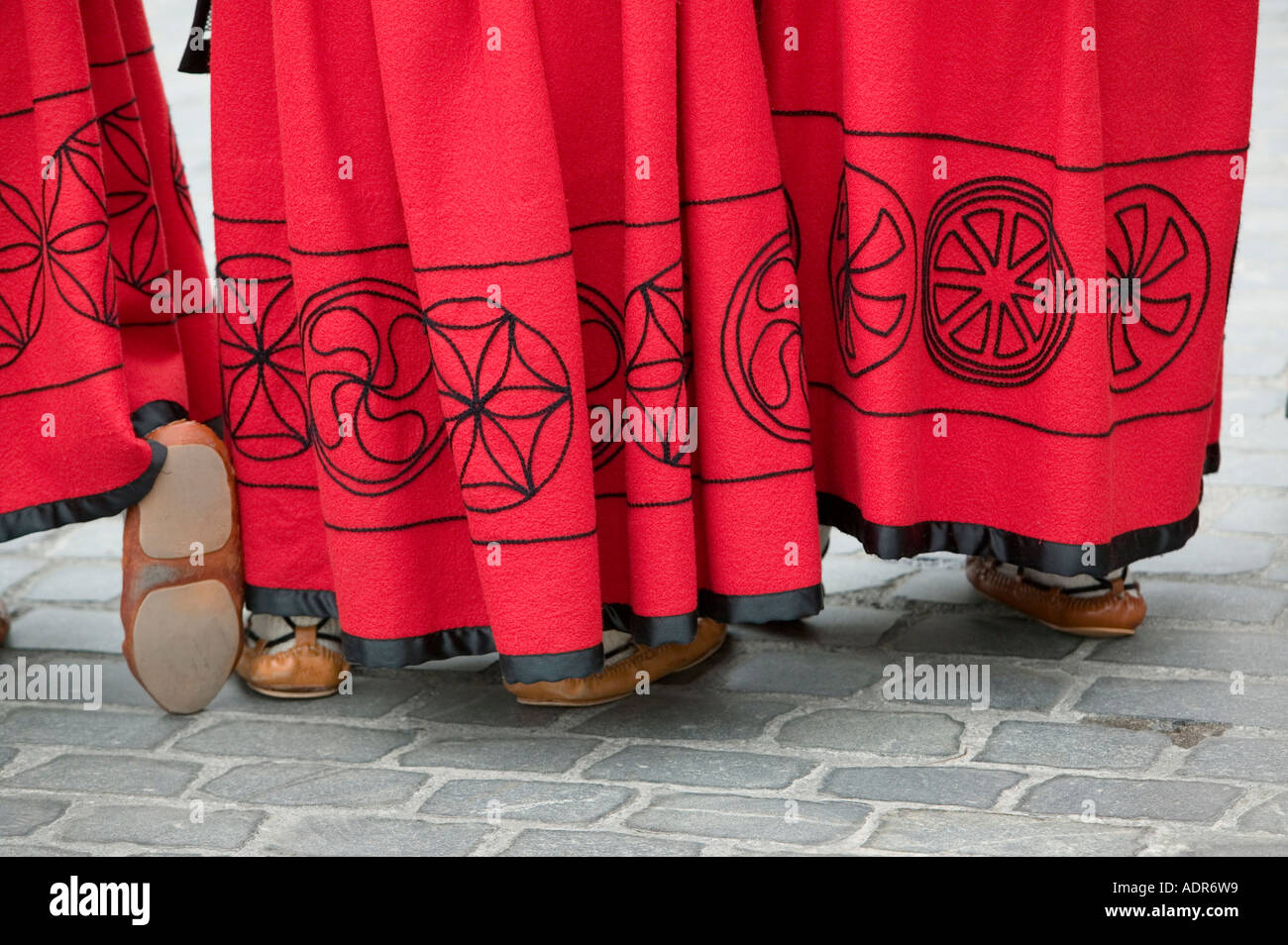 Patterns on deep red skirts worn by Basque girls during Basque folk ...