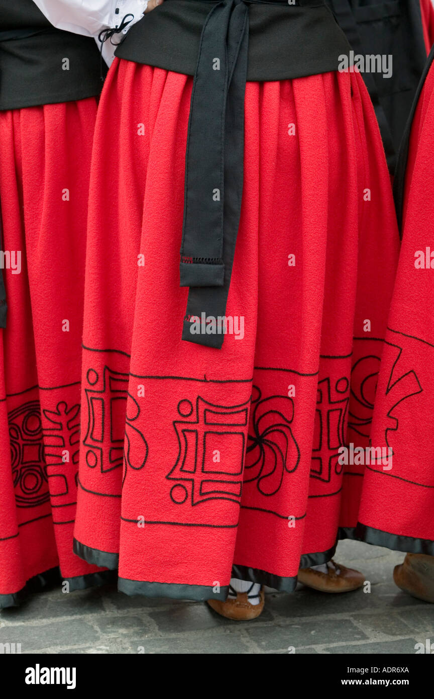 Patterns on deep red skirts worn by Basque girls during Basque folk ...