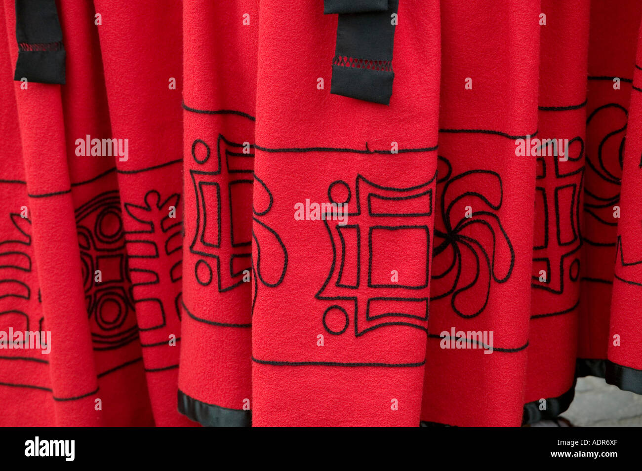 Patterns on deep red skirts worn by Basque girls during Basque folk ...