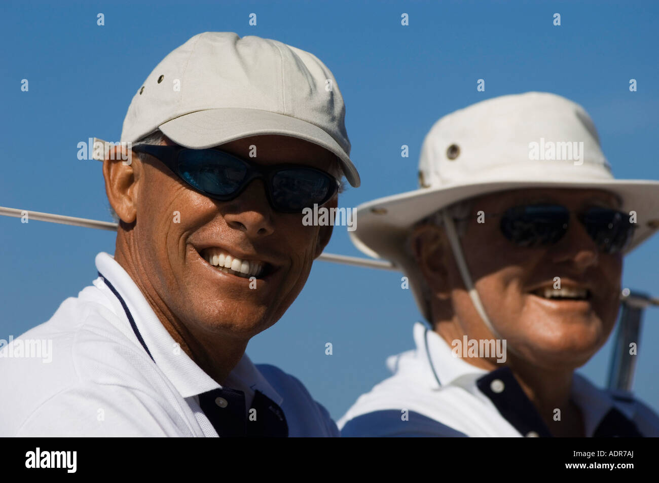 Men on yacht, portrait Stock Photo - Alamy