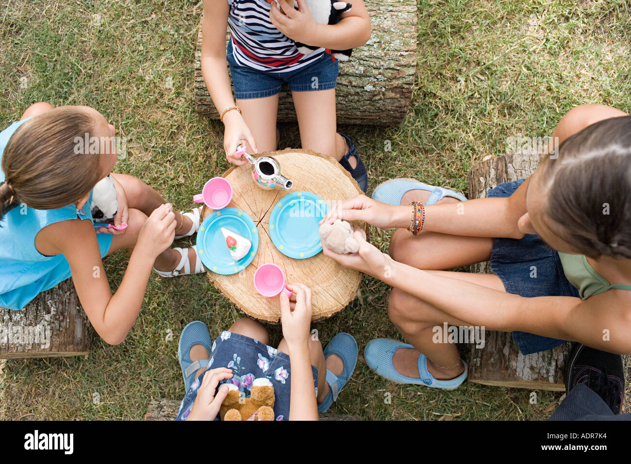 Girls having a tea party Stock Photo - Alamy