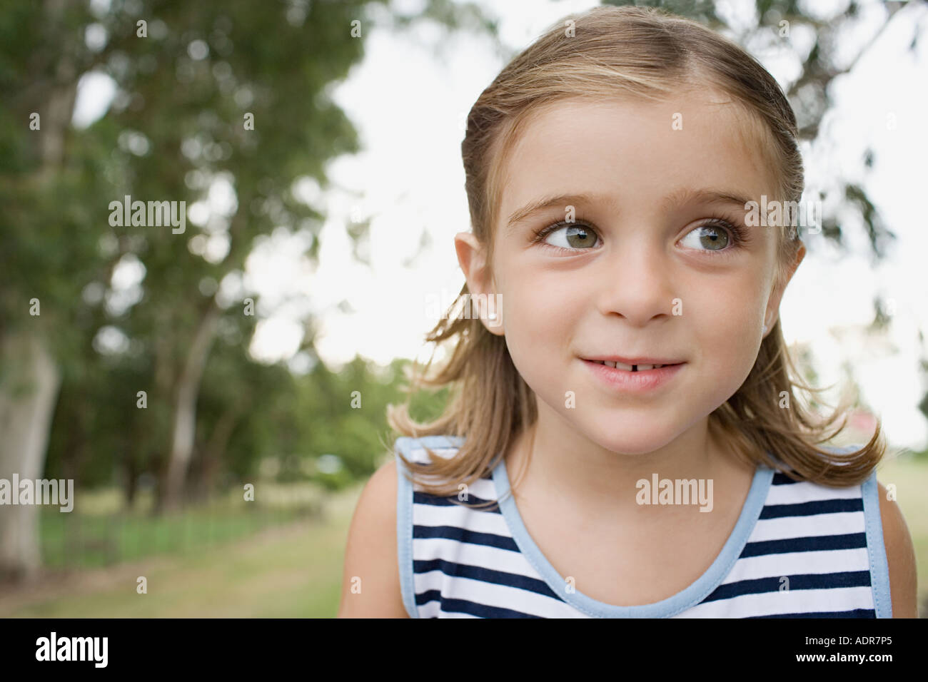 Curious looking girl Stock Photo - Alamy