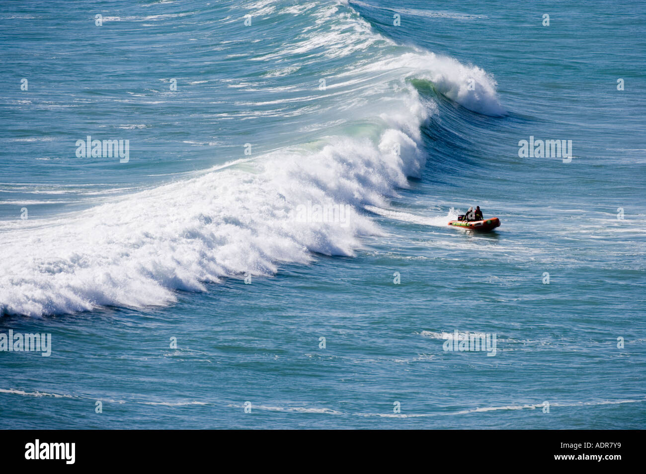 New Zealand North Island Muriwai Beach Surf Lifesavers ride in Zodiac ...