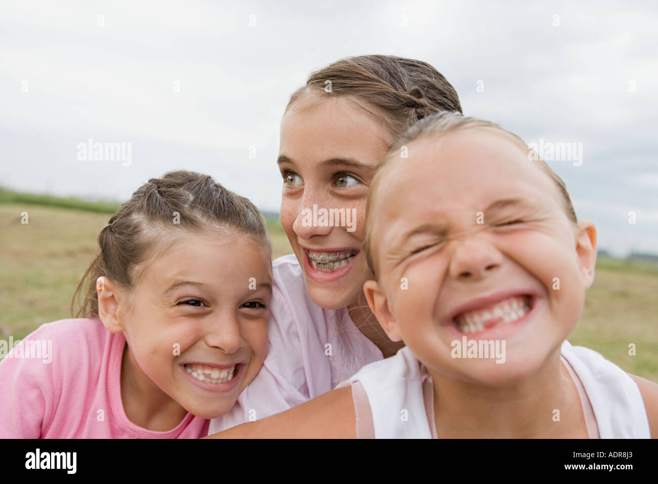 Girls making faces Stock Photo - Alamy