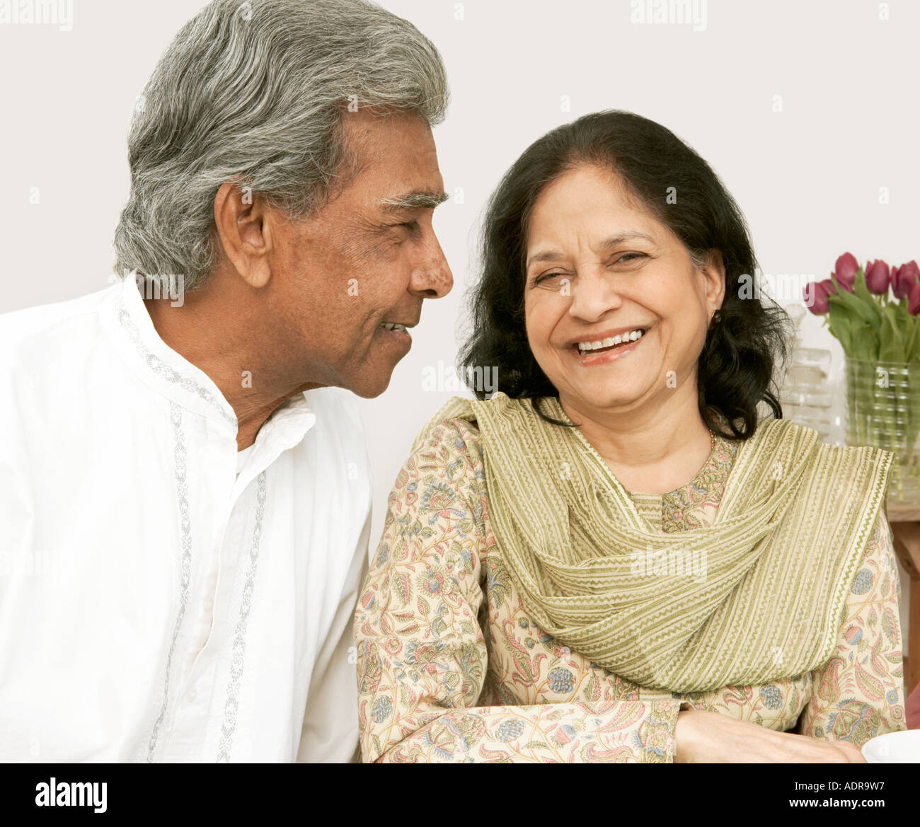 Indian senior couple laughing hi-res stock photography and images - Alamy