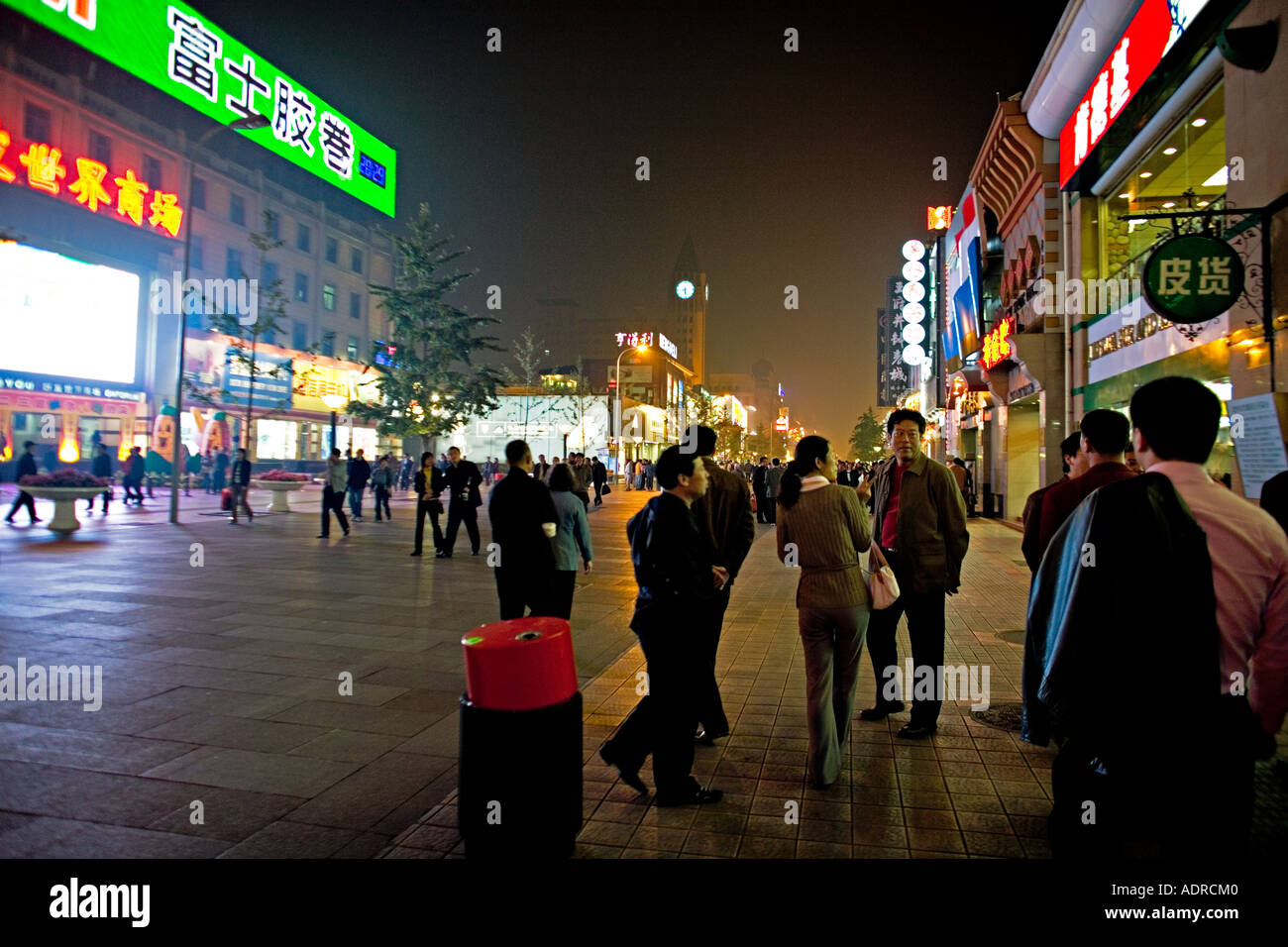 CHINA BEIJING Night scene of crowded shopping street Wangfujing Dajie ...