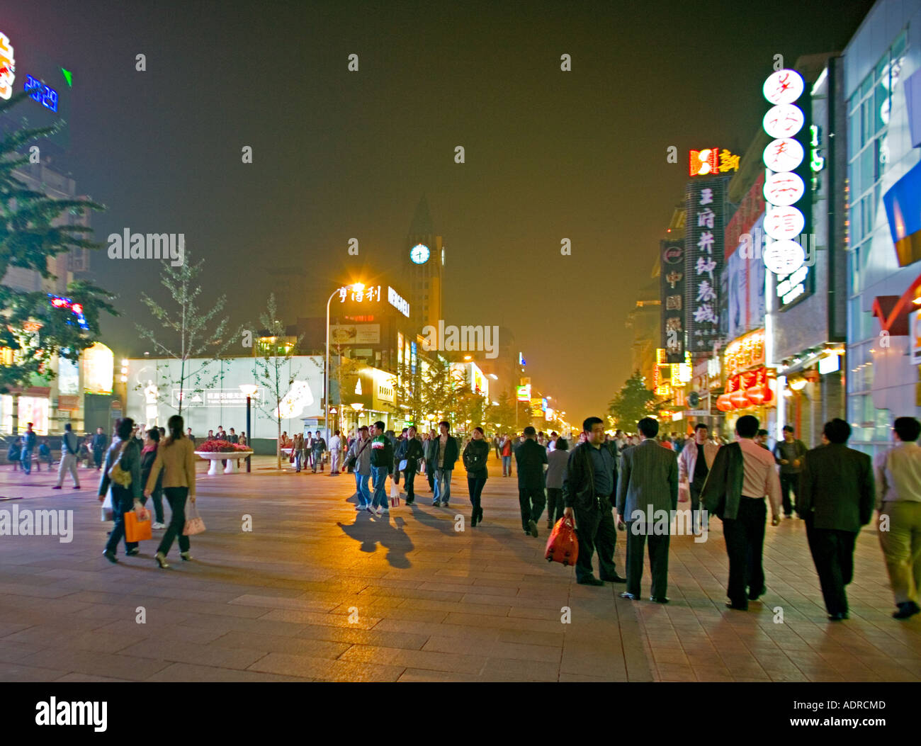 CHINA BEIJING Night scene of crowded shopping street Wangfujing Dajie ...